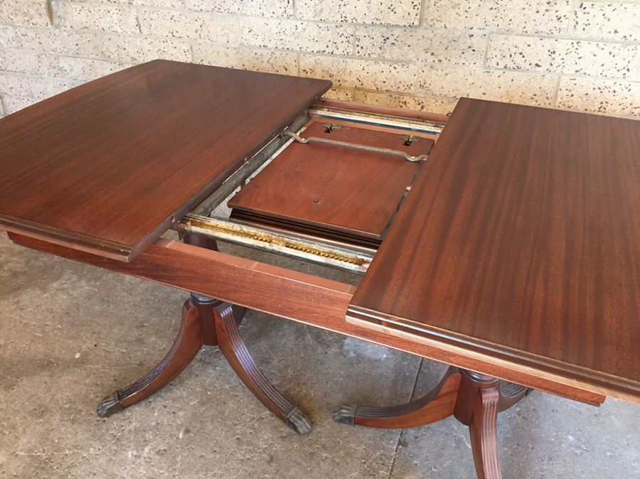 Stunning Wooden Dining Table With Built In Leaf Brass Claw Feet And